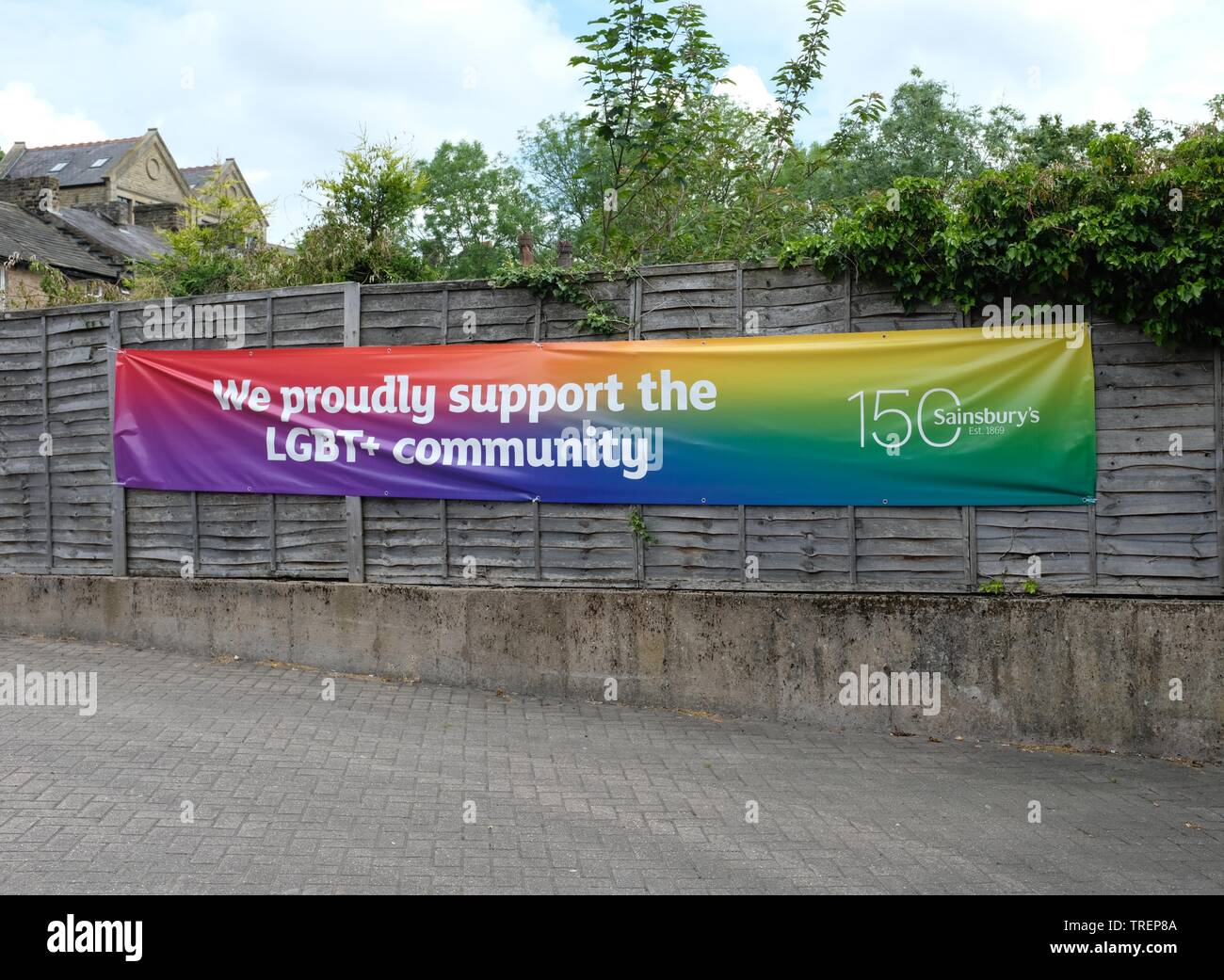 A banner supporting LGBT+ outside Sainsbury's in New Mills, Derbyshire ...