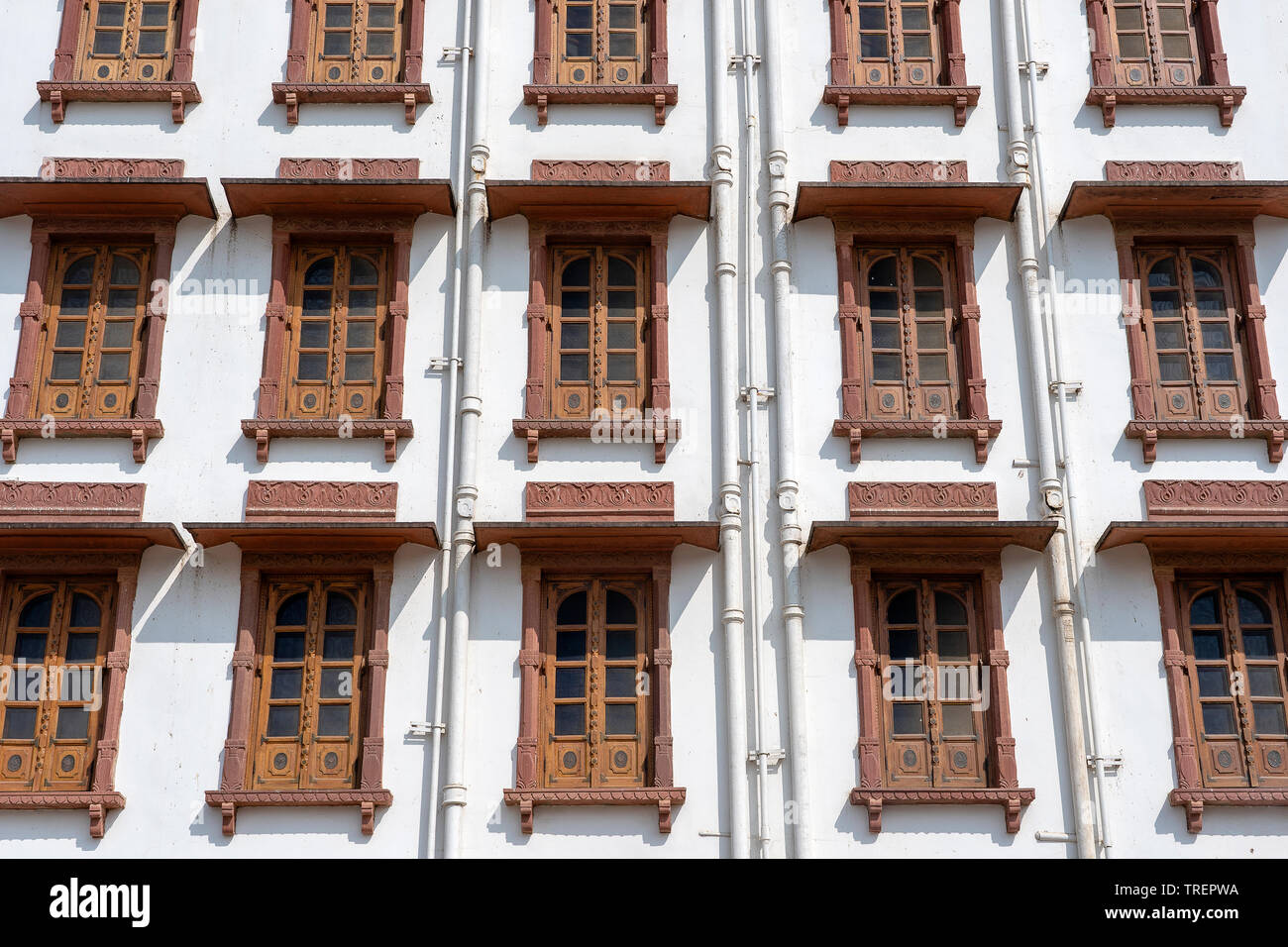 White wall with windows decorated in Indian style in Pushkar, Rajasthan ...