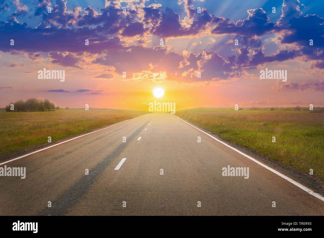 beautiful sunset over the country highway Stock Photo - Alamy