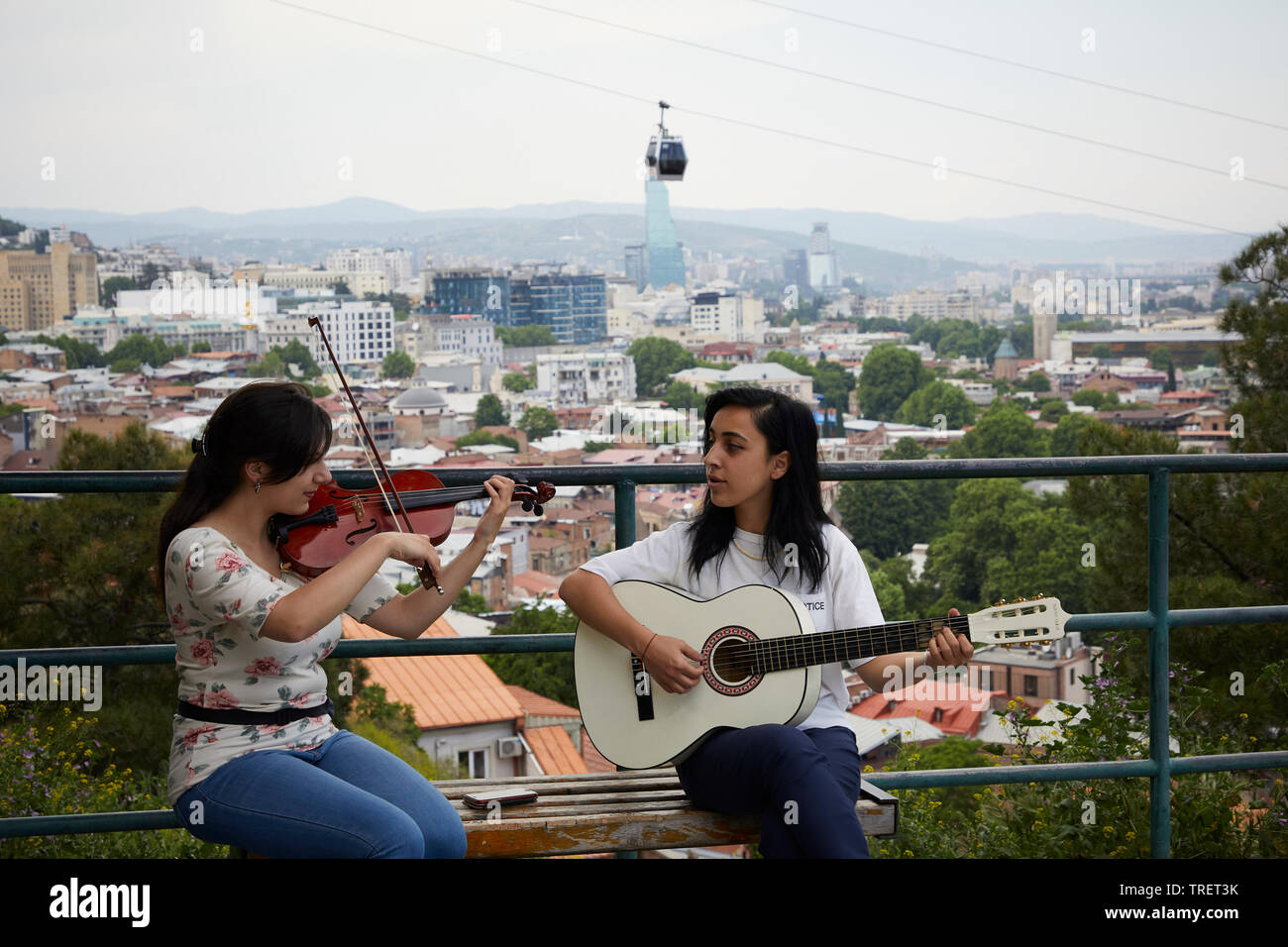 Young girls playing and singing. View from Tbilisi Stock Photo - Alamy