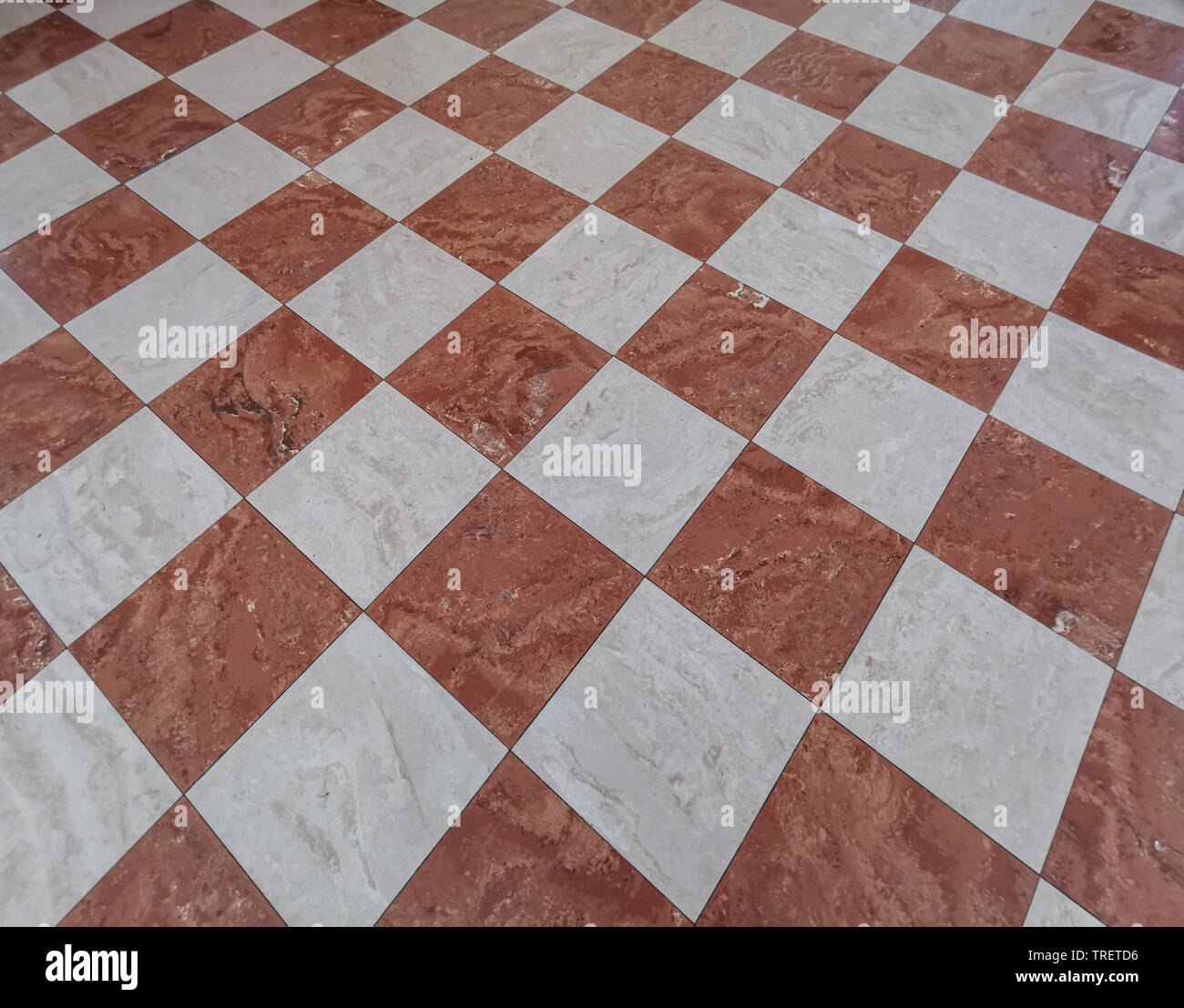 red and white tiles medieval floor background Stock Photo - Alamy