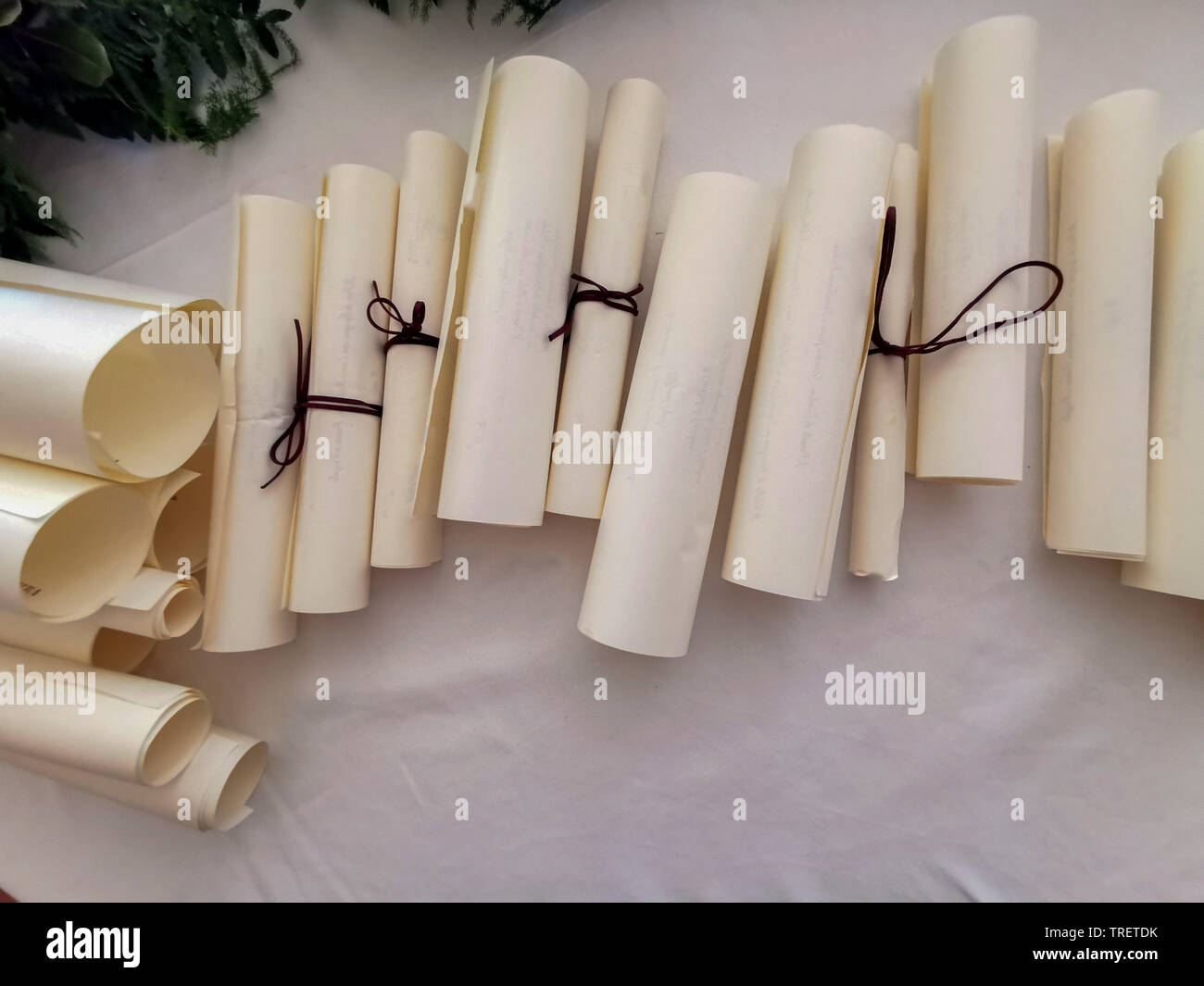 Parchment scroll vellum on a table detail Stock Photo - Alamy