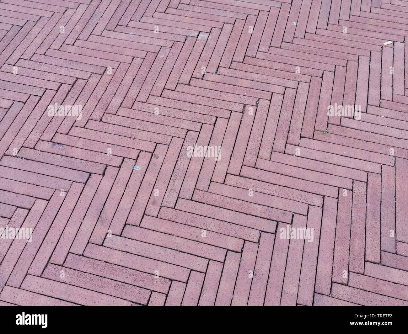 red bricks floor promenade walk background Stock Photo - Alamy