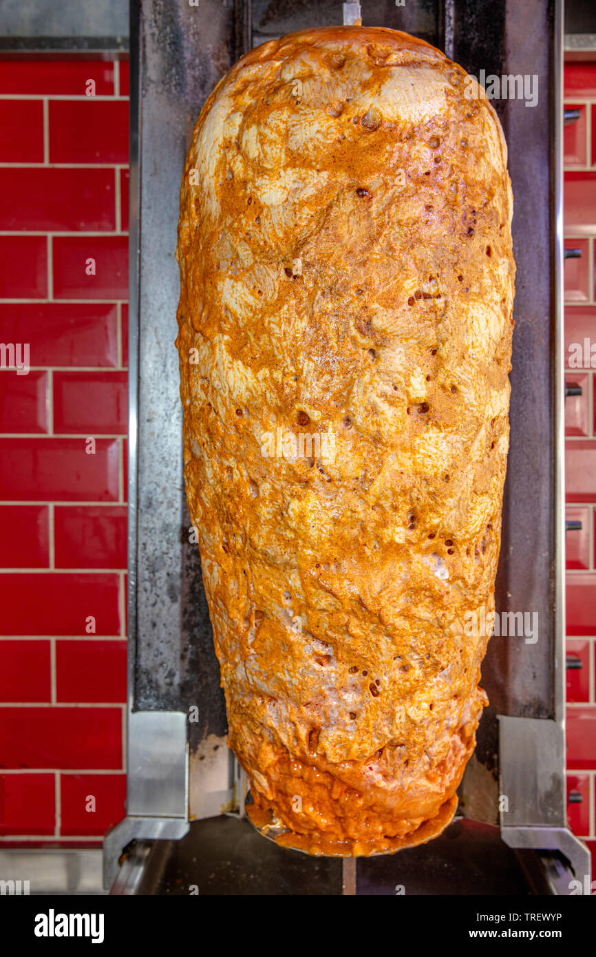Turkish cuisine Chicken Doner; Rotary cooking in the quarry Stock Photo ...