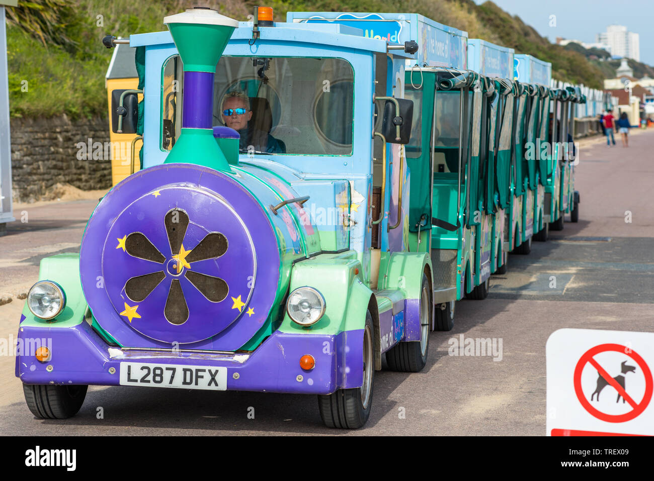 A Land train takes people for rides along the seafront promenade at ...