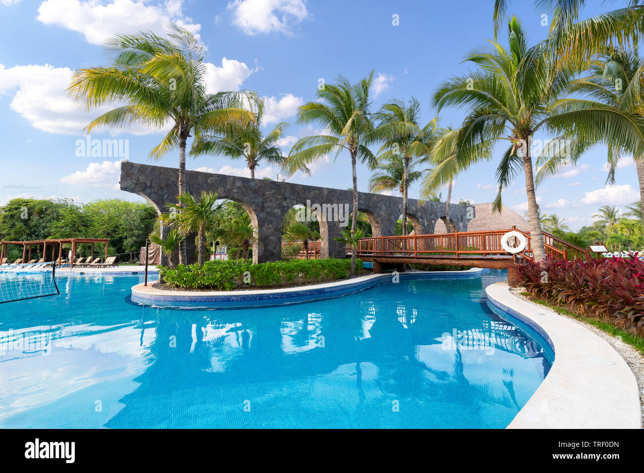 The pool at the Valentin Imperial Maya features a waterfall, volleyball ...