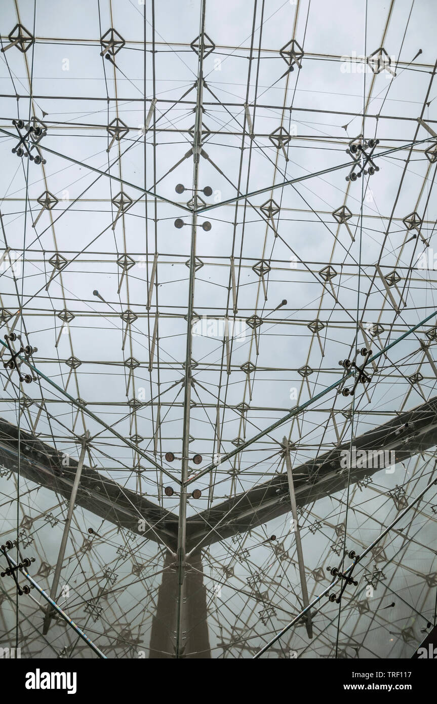 Close-up of the glass and steel ceiling structure on the Louvre Museum ...