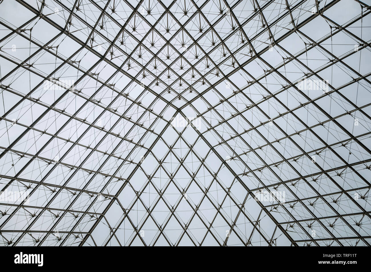 Close-up of the glass and steel ceiling structure on the Louvre Museum ...