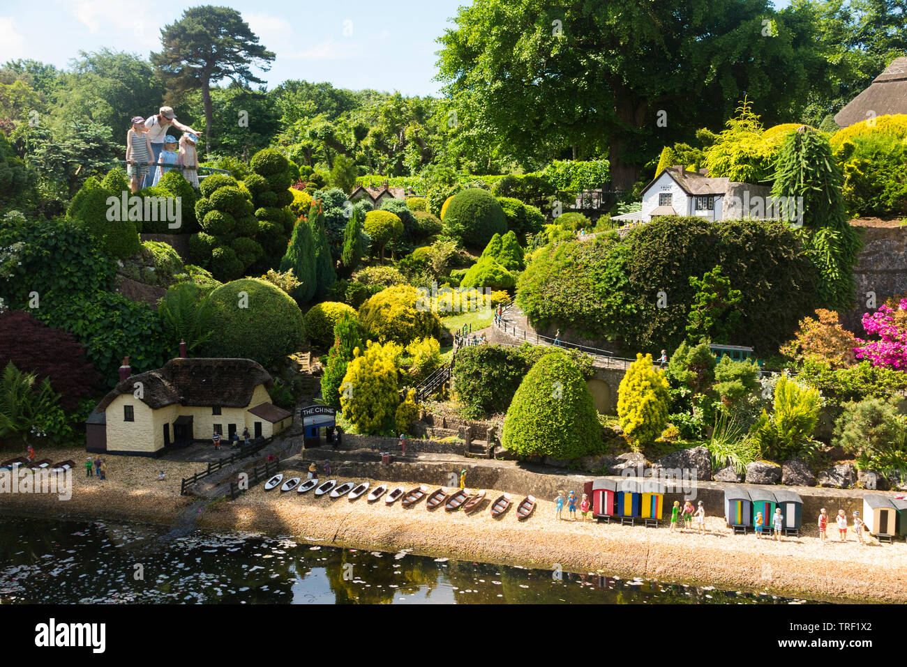 Visitors / tourists / people visit the garden, miniature buildings and ...