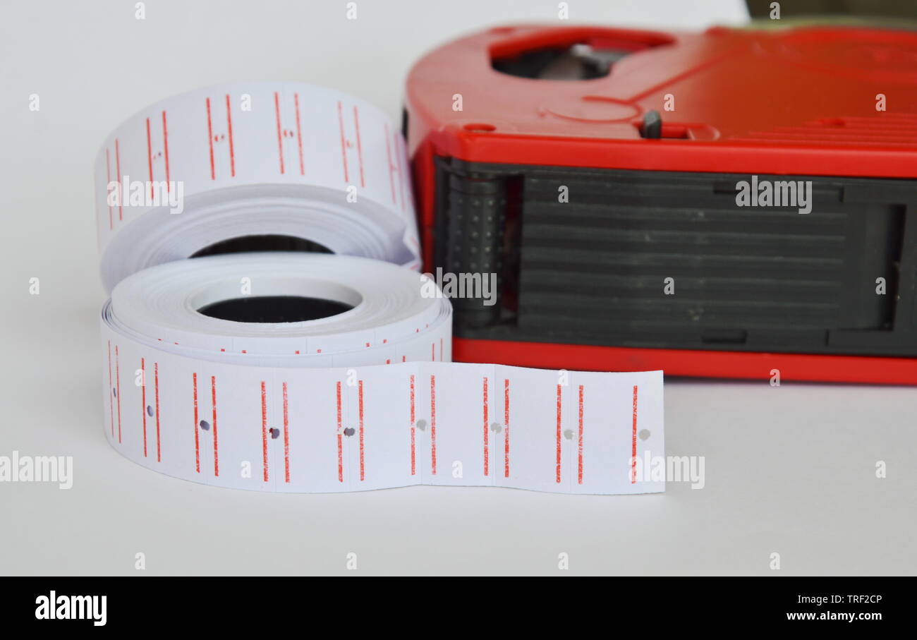 sticker tag and price hand labeler on white background Stock Photo - Alamy