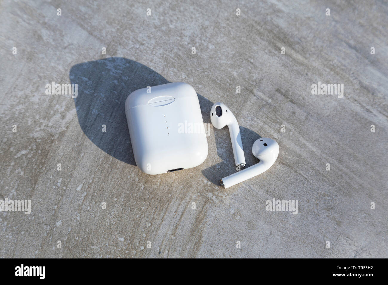 White Wireless Earphone with Case Top View Close Up Capture Stock Photo ...
