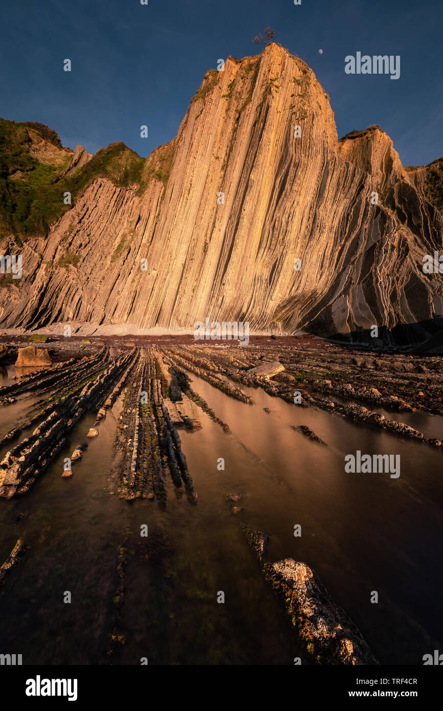 Beach of Itzurun at Zumaia with the famous flysch coast, Basque Country ...