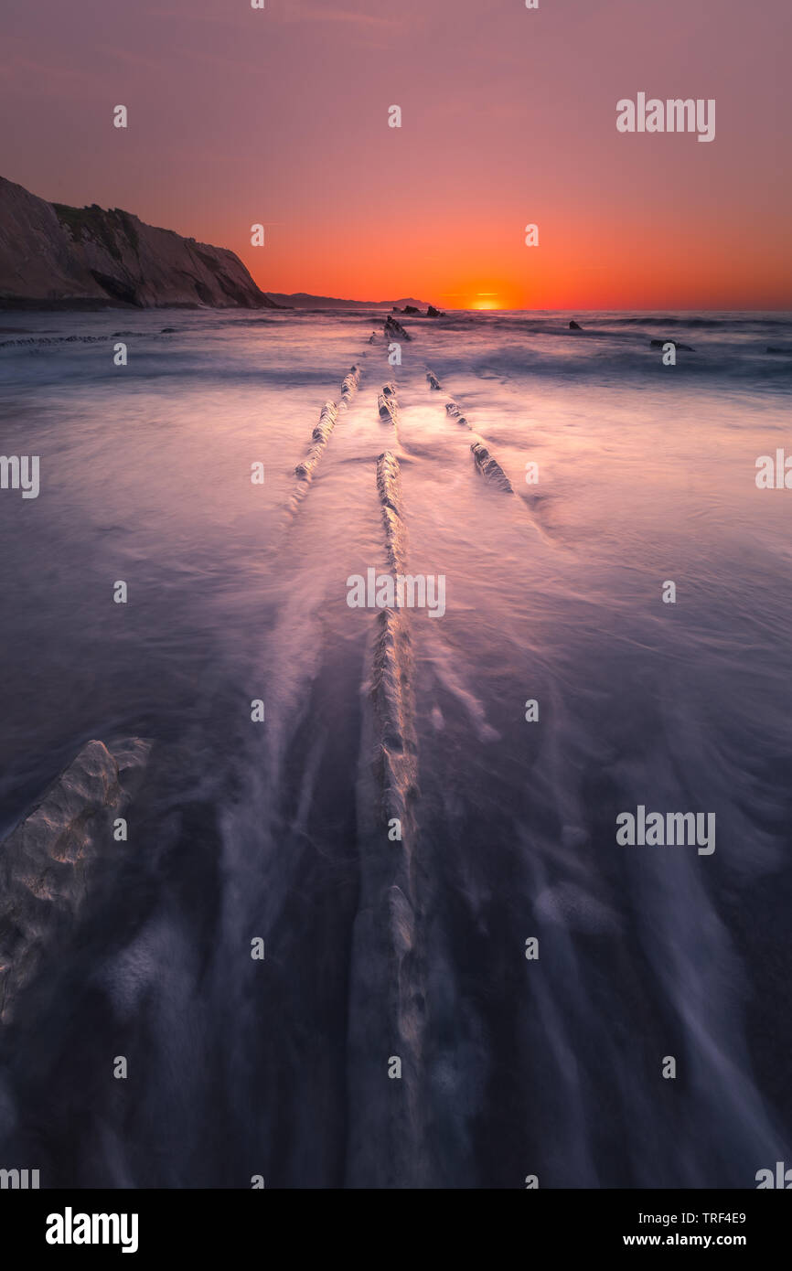 Beach of Itzurun at Zumaia with the famous flysch coast, Basque Country ...