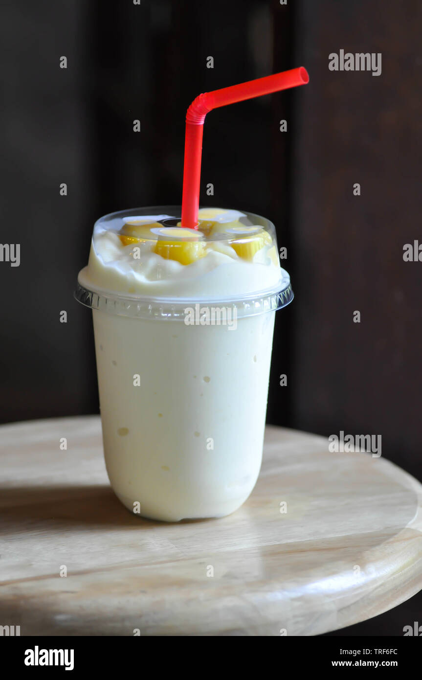 mango smoothie or mango yogurt smoothie with mango topping Stock Photo ...