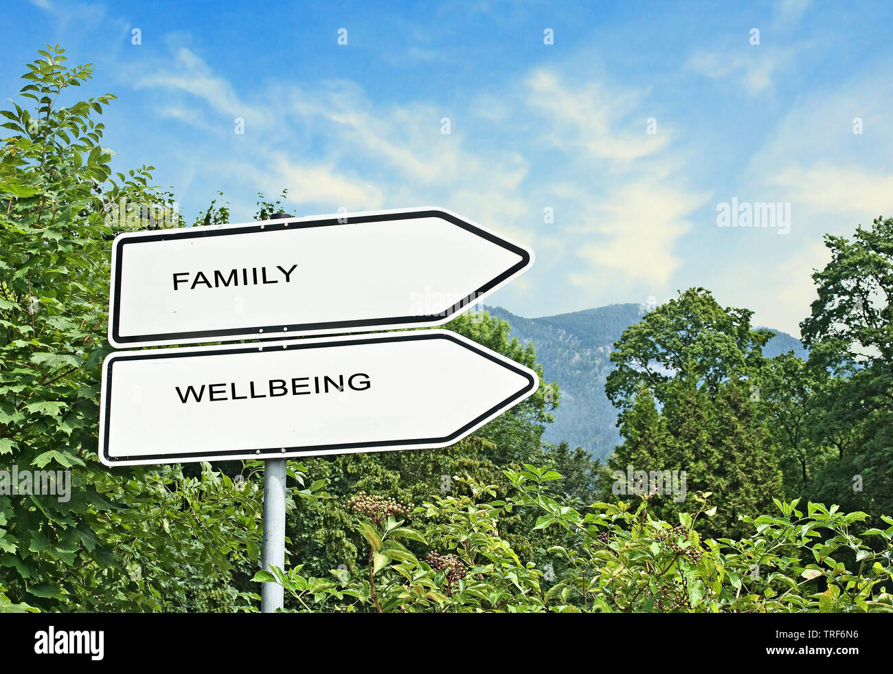 Road sign to family and wellbeing Stock Photo - Alamy