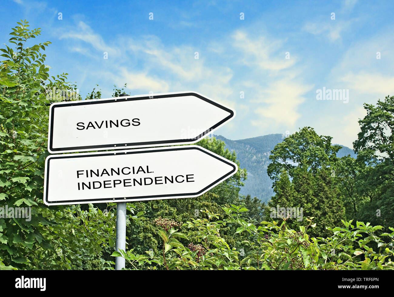 Road signs to savings and financial independence Stock Photo - Alamy
