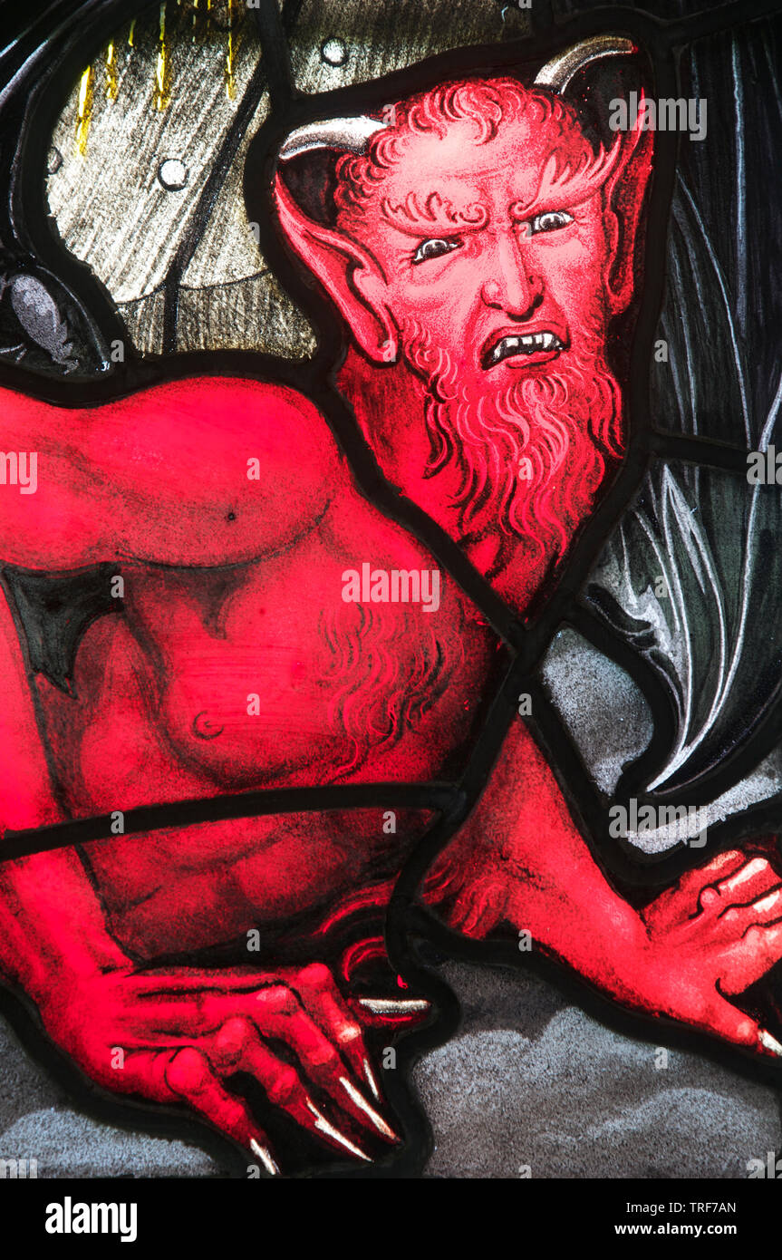 Portrait representing The Devil, in stained glass. Detail of a window ...