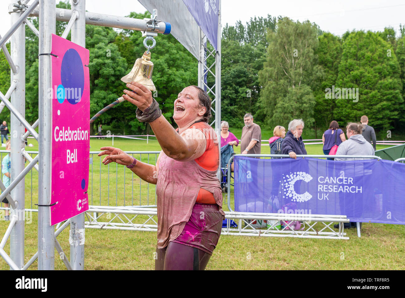 Woman ringing bell cancer hi-res stock photography and images - Alamy