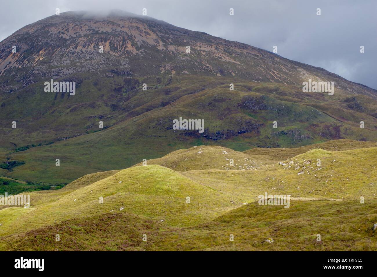 Rugged Undulating Heath by Beinn na Caillich, Red Cuillin Hills under a ...