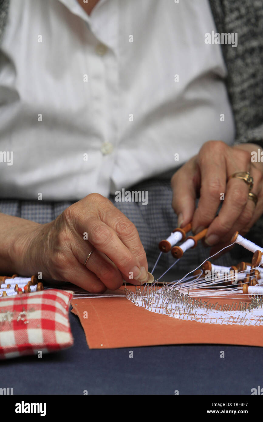 Lace maker at work Stock Photo - Alamy