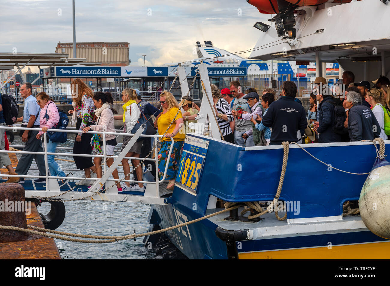 Naples, Italy - May 30, 2019: passengers get off the hydrofoil through ...