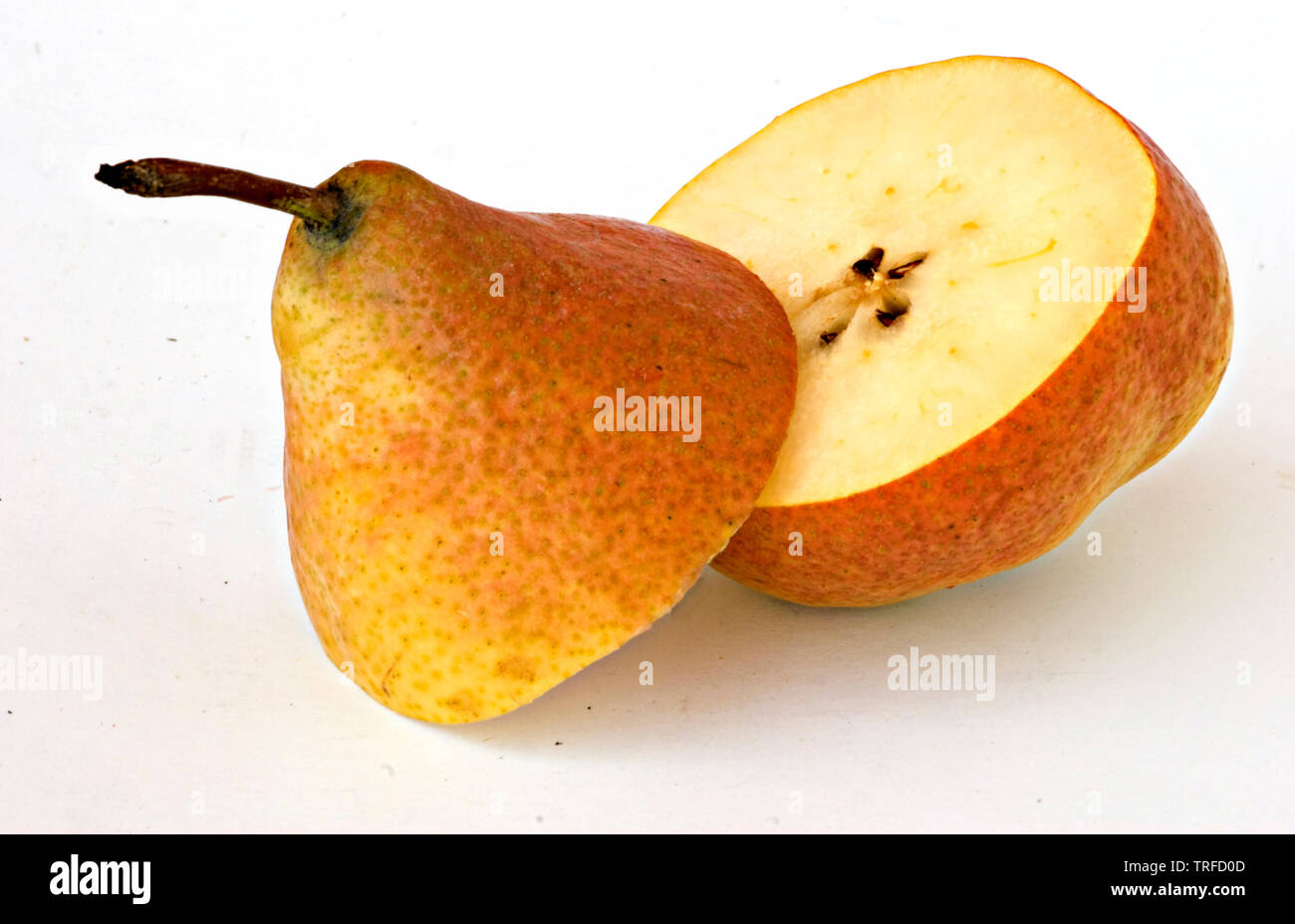 Sections of pear isolated on white background Stock Photo - Alamy