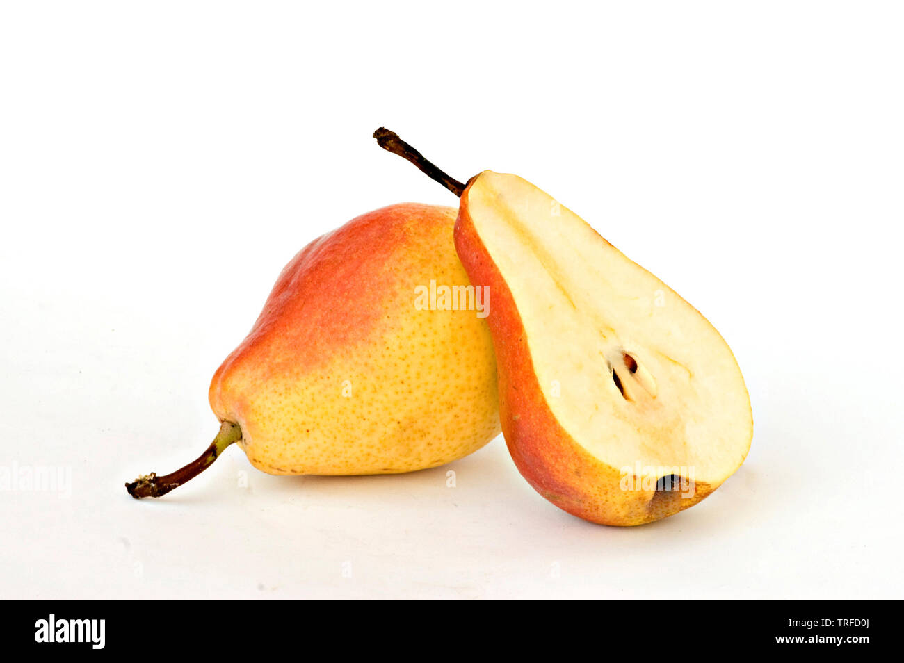 Pear and its section isolated on white background Stock Photo - Alamy