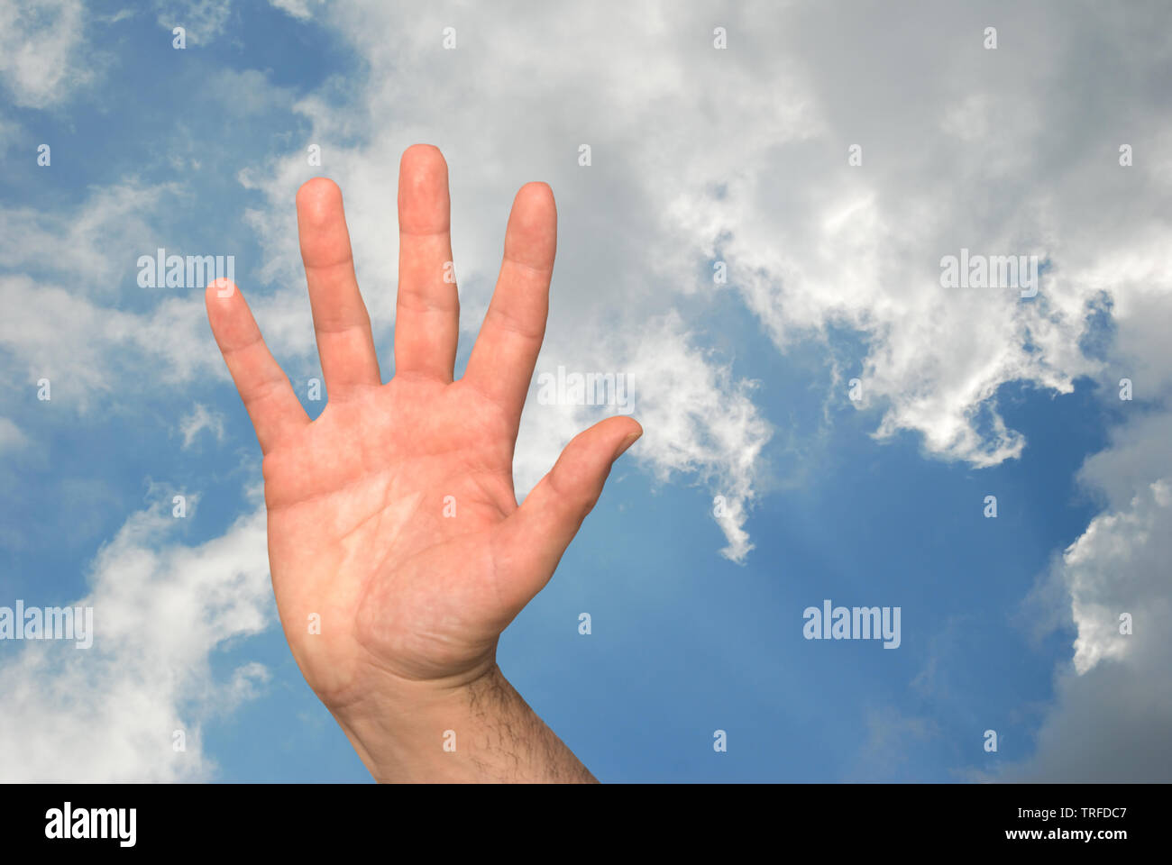 High five on sky background Stock Photo - Alamy