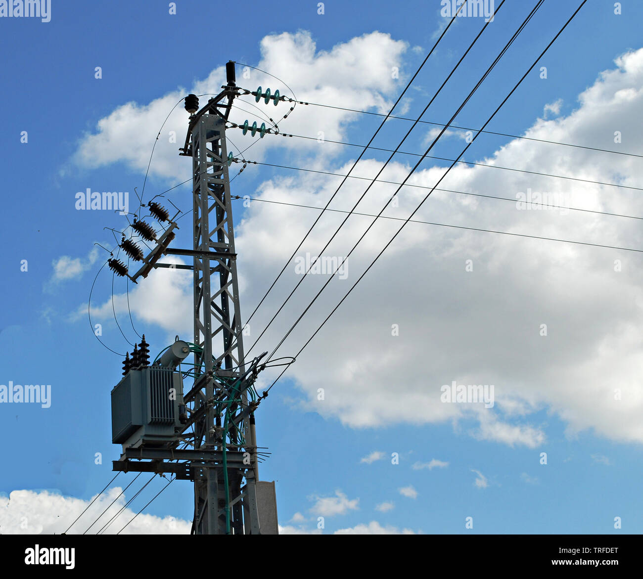 An overhead power line and a lowering transformer Stock Photo - Alamy