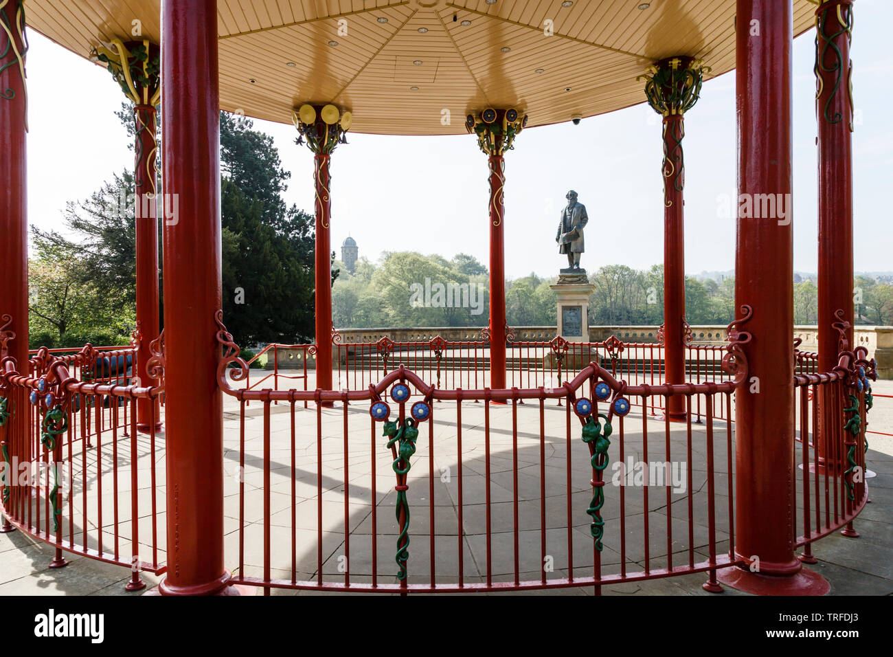 View through the bandstand towards the statue of Sir Titus Salt in ...