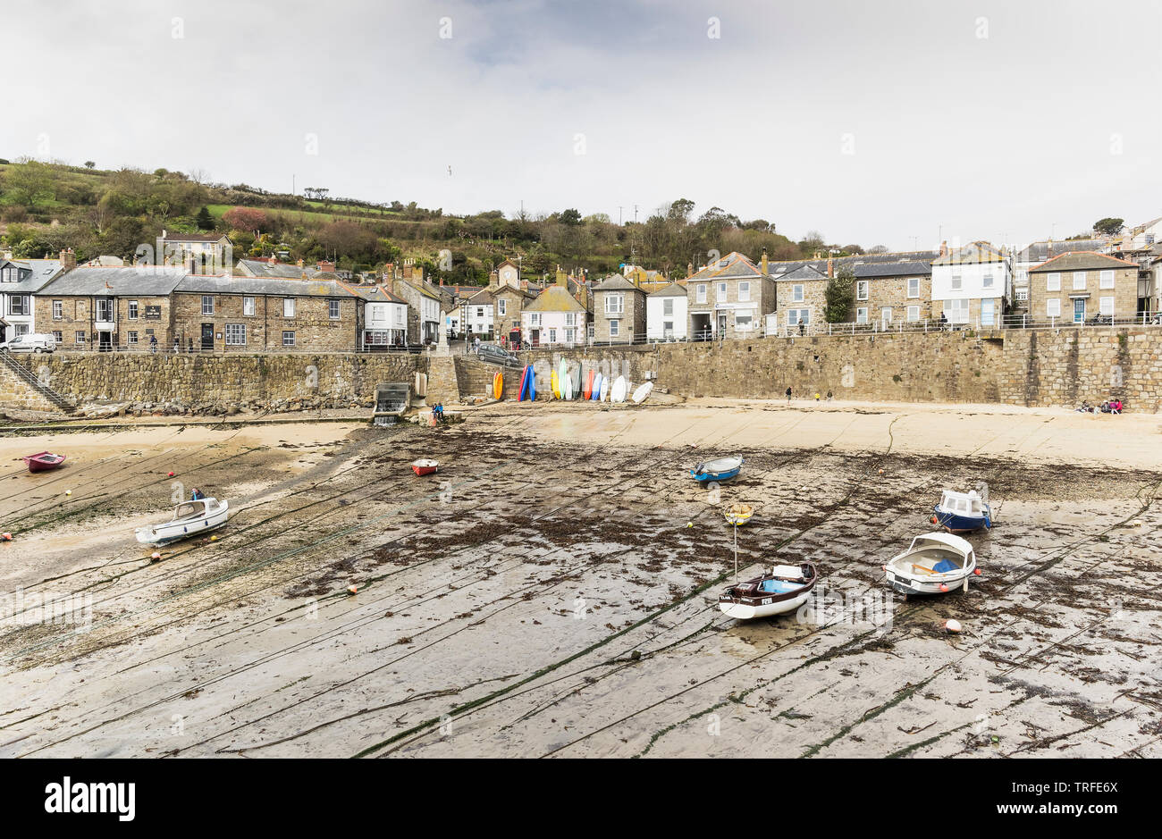 Harbour of the Cornish fishing village of Mousehole Stock Photo - Alamy