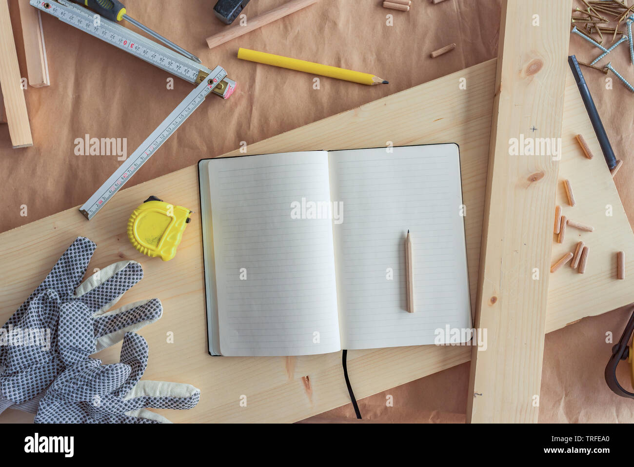 Open note book with blank pages as mock up copy space in woodwork ...
