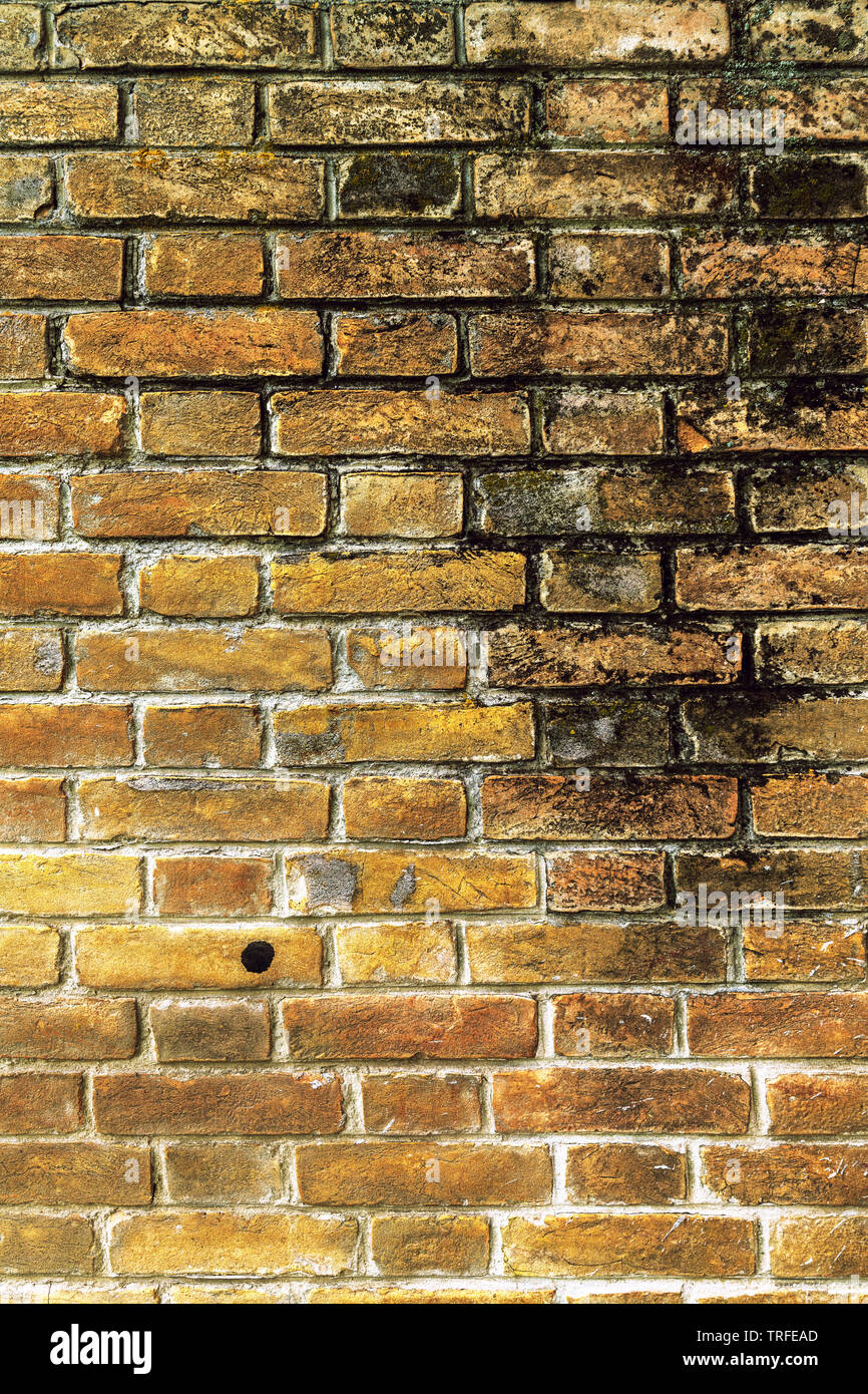 Old brick wall background, distressed messy grunge exterior facade ...