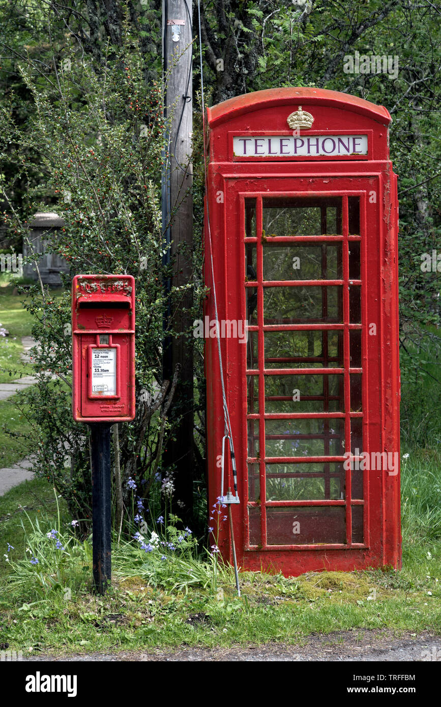 Red telephone box and postbox in a rural setting near Feshiebridge in ...
