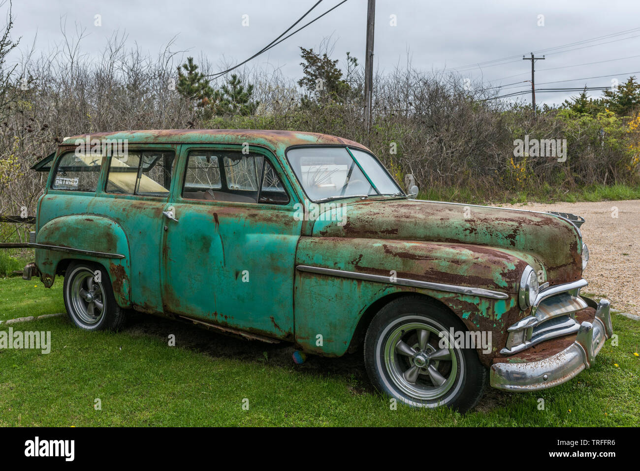 green old classic car rusting away Stock Photo - Alamy