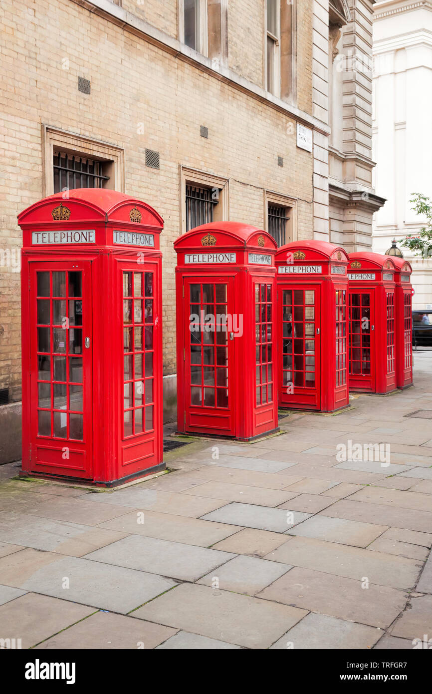 Famous red telephone booths in Covent Garden street, London, England ...