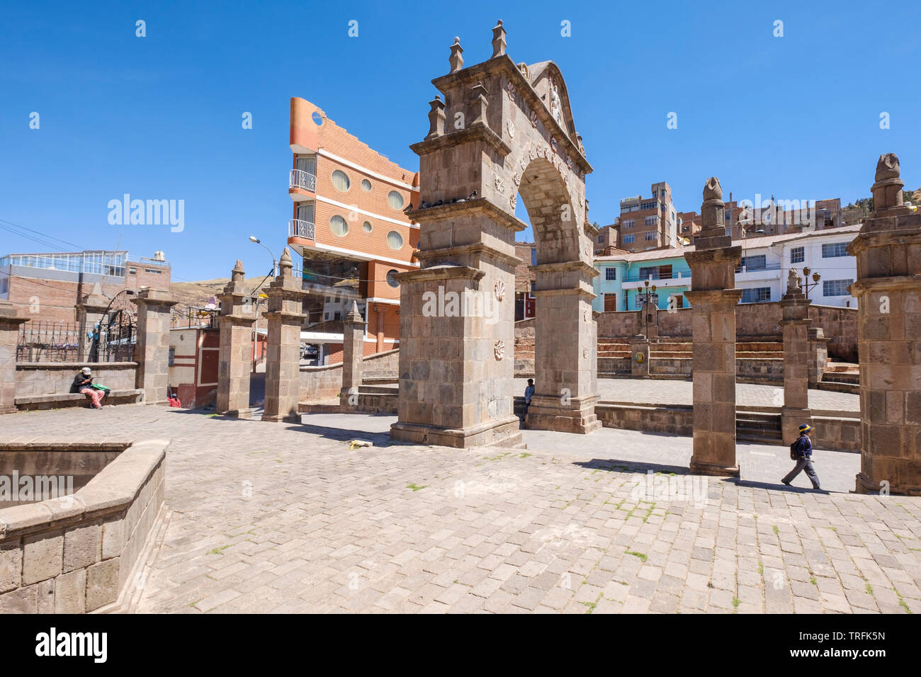 Local people walking through the Deustua Arch, a monument to pay ...