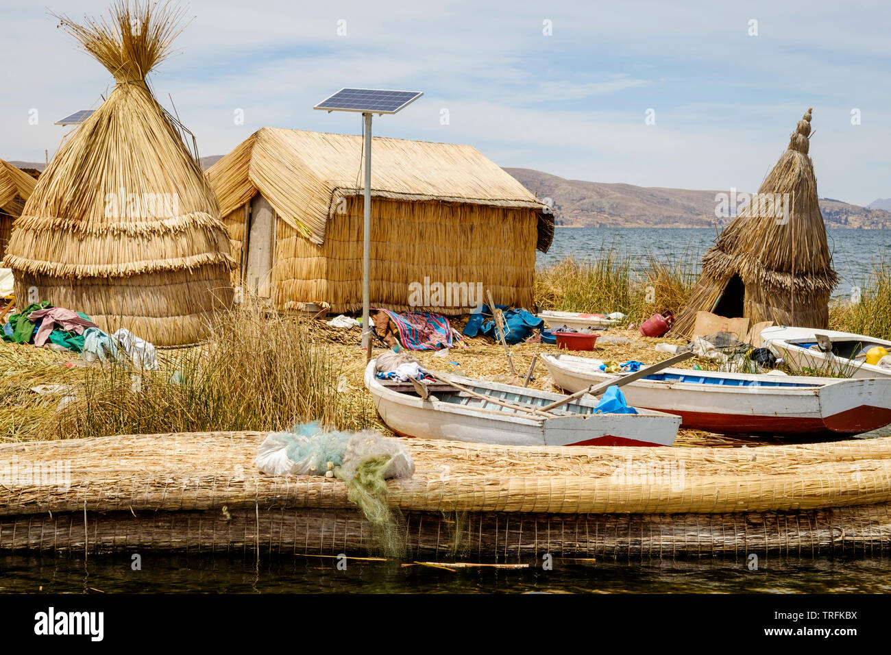 Floating islands on Lake Titicaca are built by Uros people with totora ...