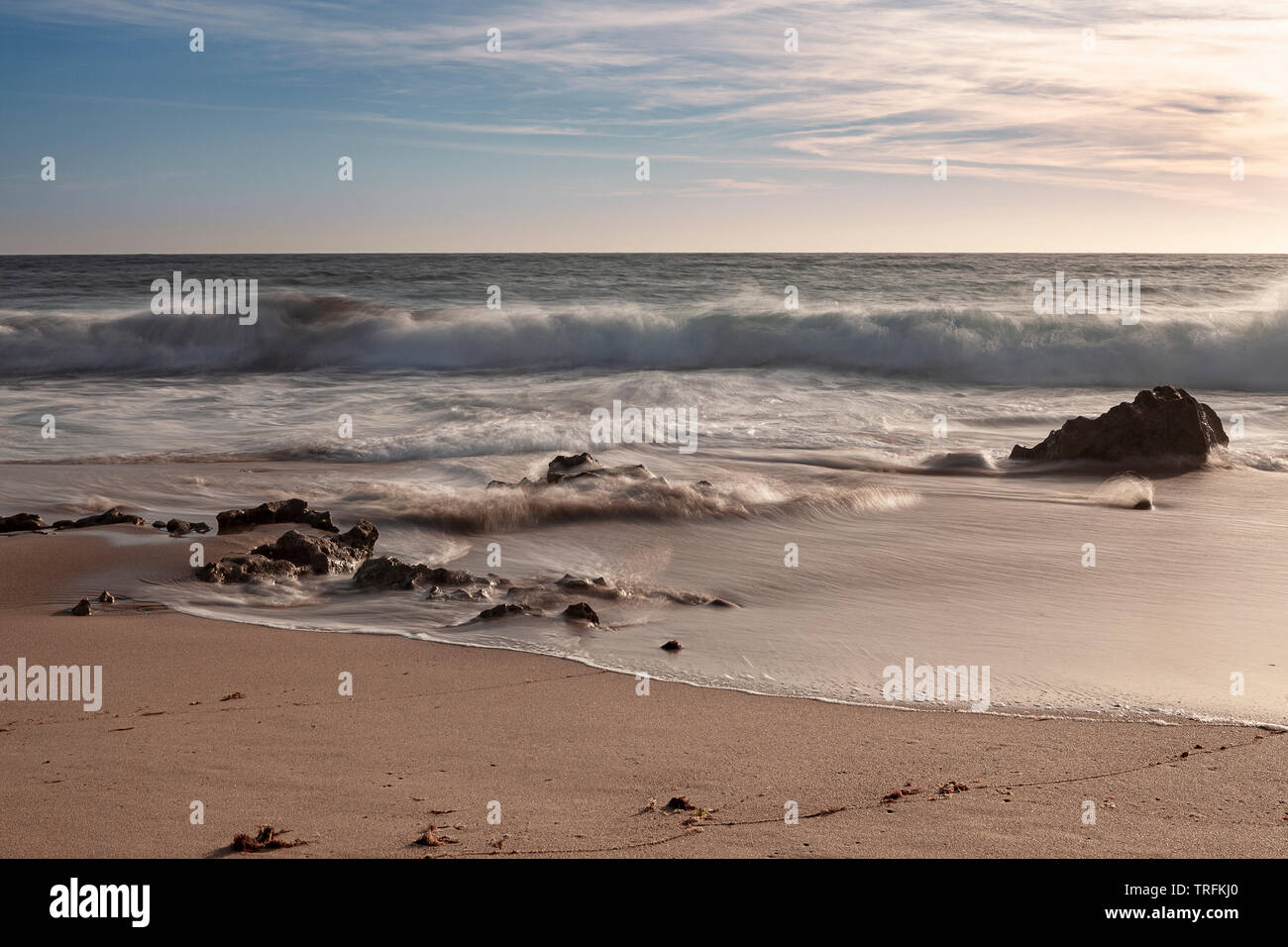 Rocks waves on paradise beach hi-res stock photography and images - Alamy