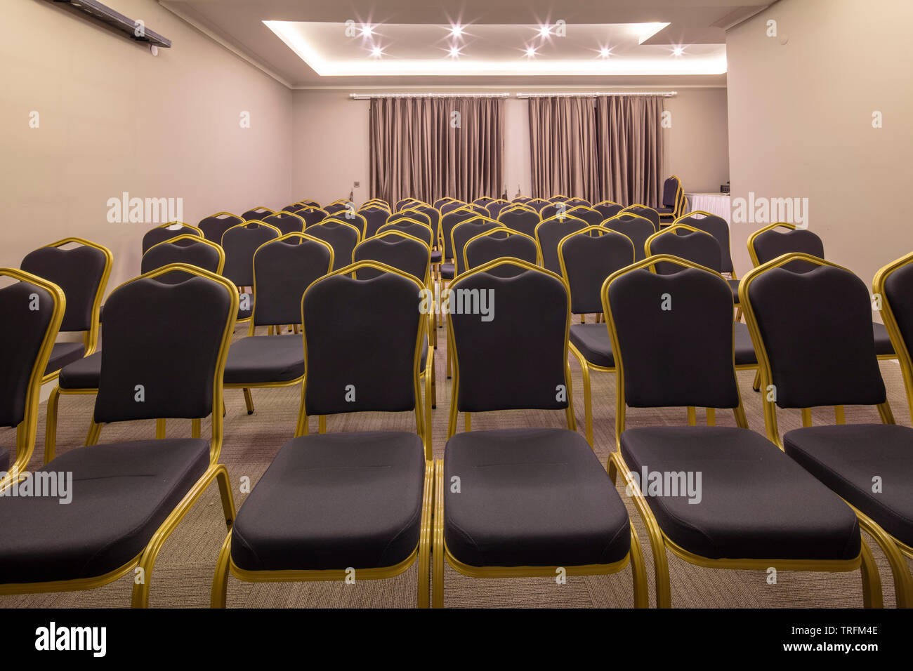 Seminar presentation. Empty conference room, lots of empty seats ...