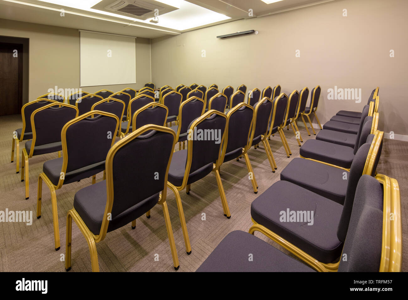 Seminar presentation. Empty conference room, lots of empty seats ...