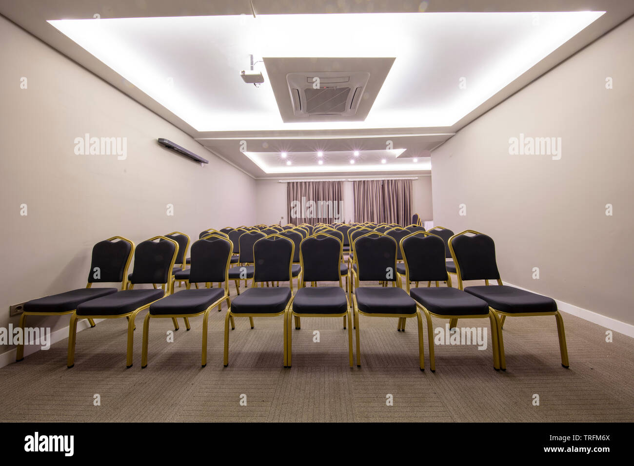 Seminar presentation. Empty conference room, lots of empty seats ...