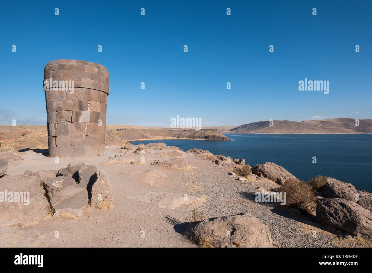 Impressive pre-Inca burial tower called chullpa with the Lake Umayo in ...