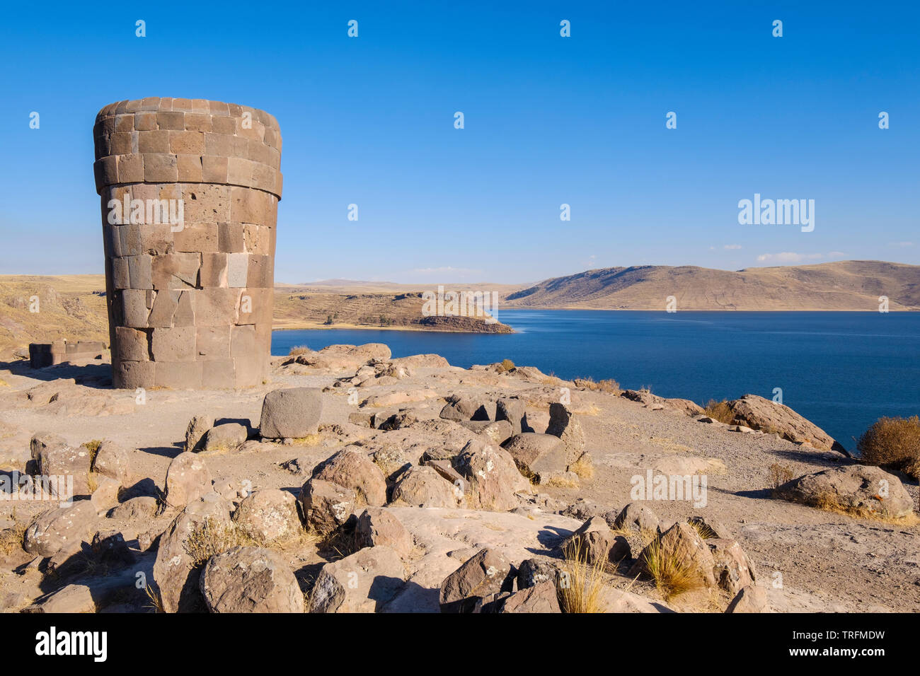 Impressive pre-Inca burial tower called chullpa with the Lake Umayo in ...