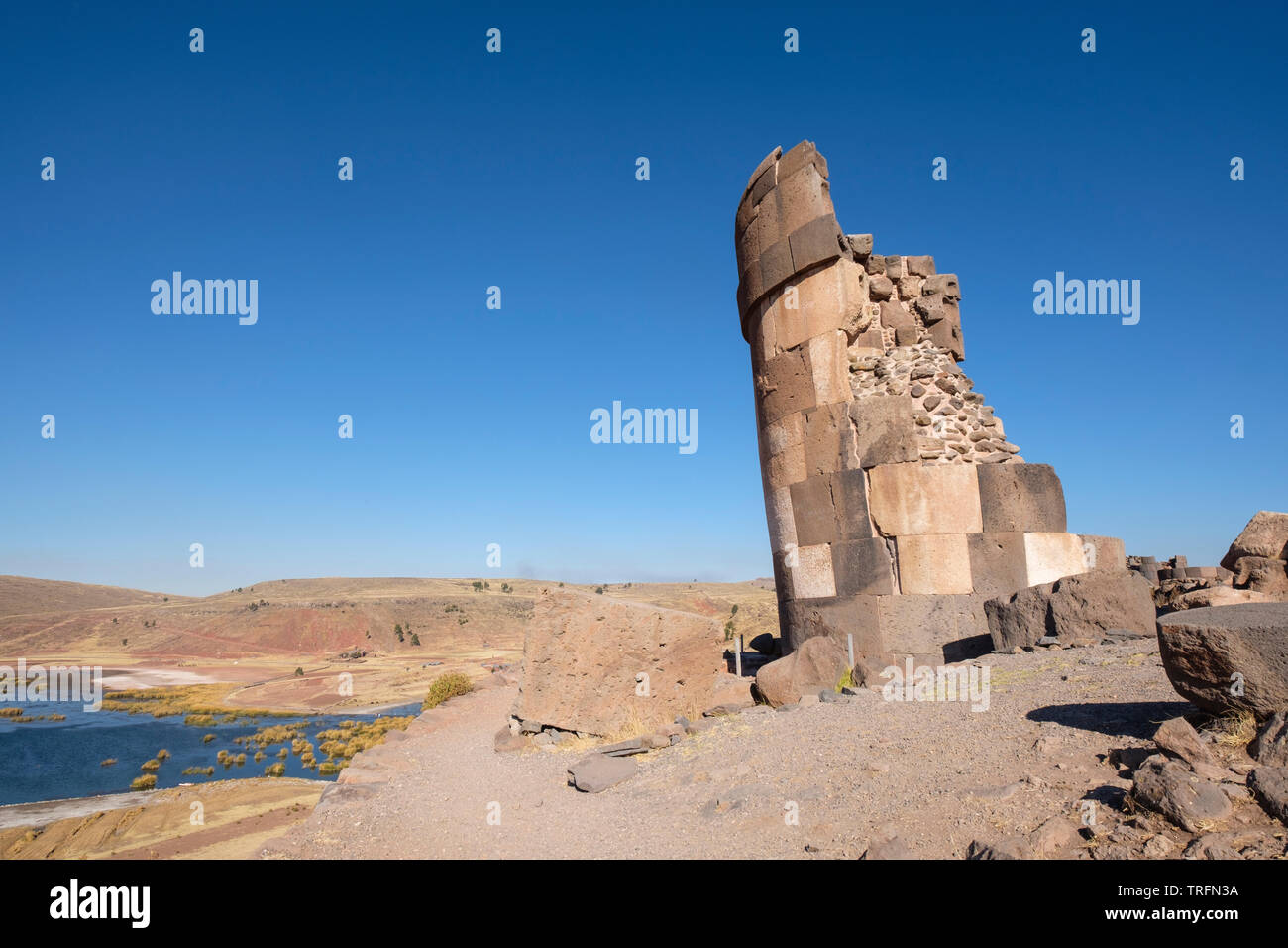 Impressive pre-Inca burial tower called chullpa with the Lake Umayo in ...
