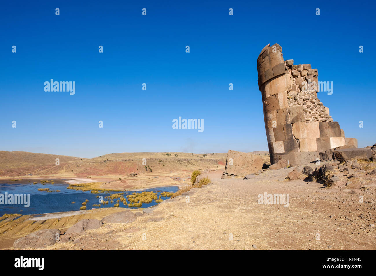 Impressive pre-Inca burial tower called chullpa with the Lake Umayo in ...