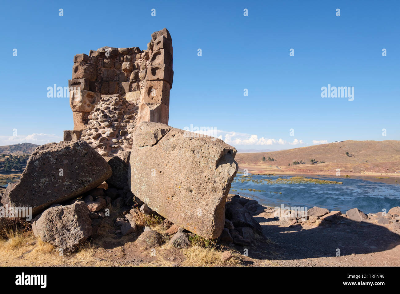 Impressive pre-Inca burial tower called chullpa with the Lake Umayo in ...