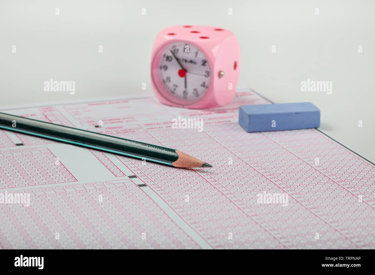 School Students hands taking exams, writing examination holding pencil ...