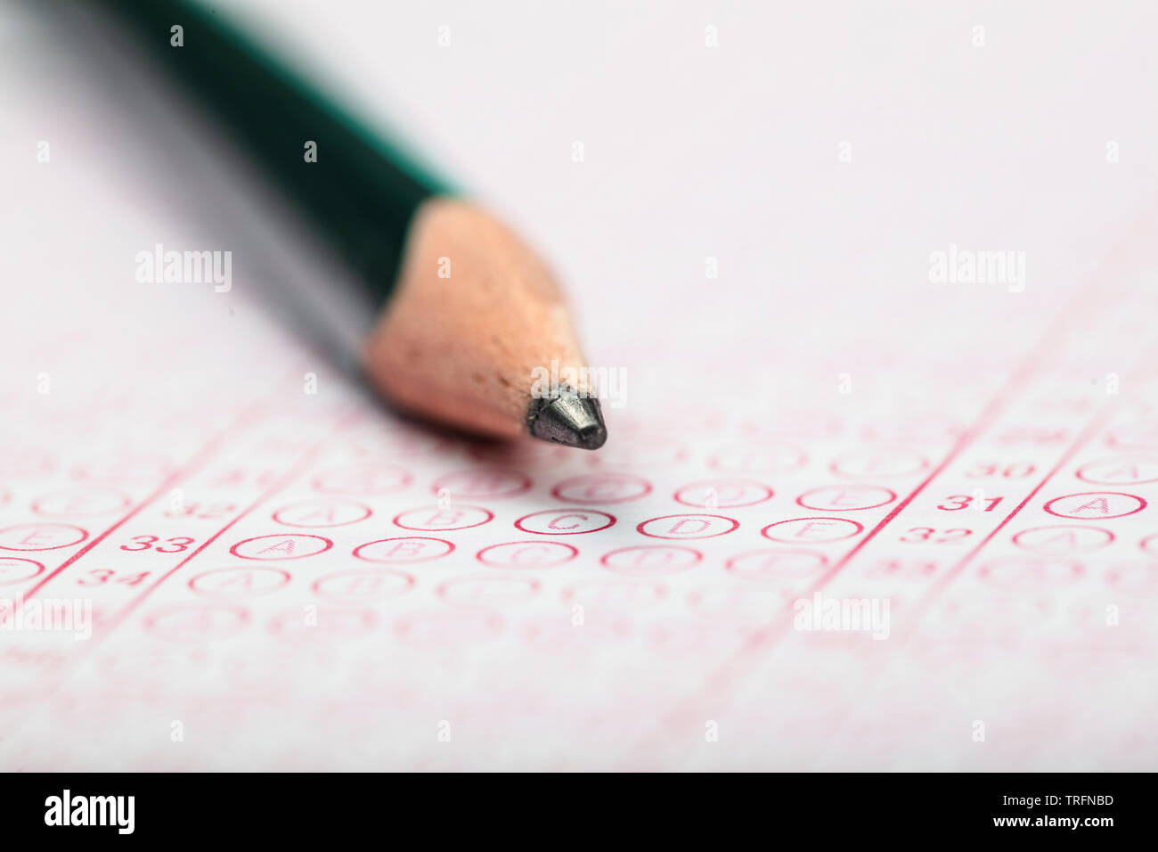 School Students hands taking exams, writing examination holding pencil ...