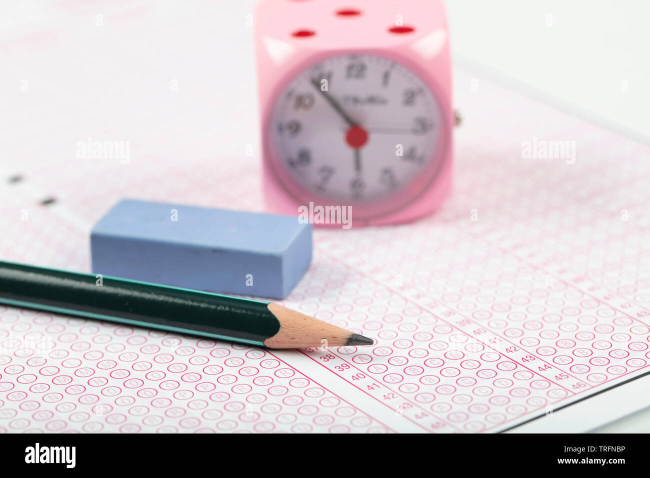School Students hands taking exams, writing examination holding pencil ...